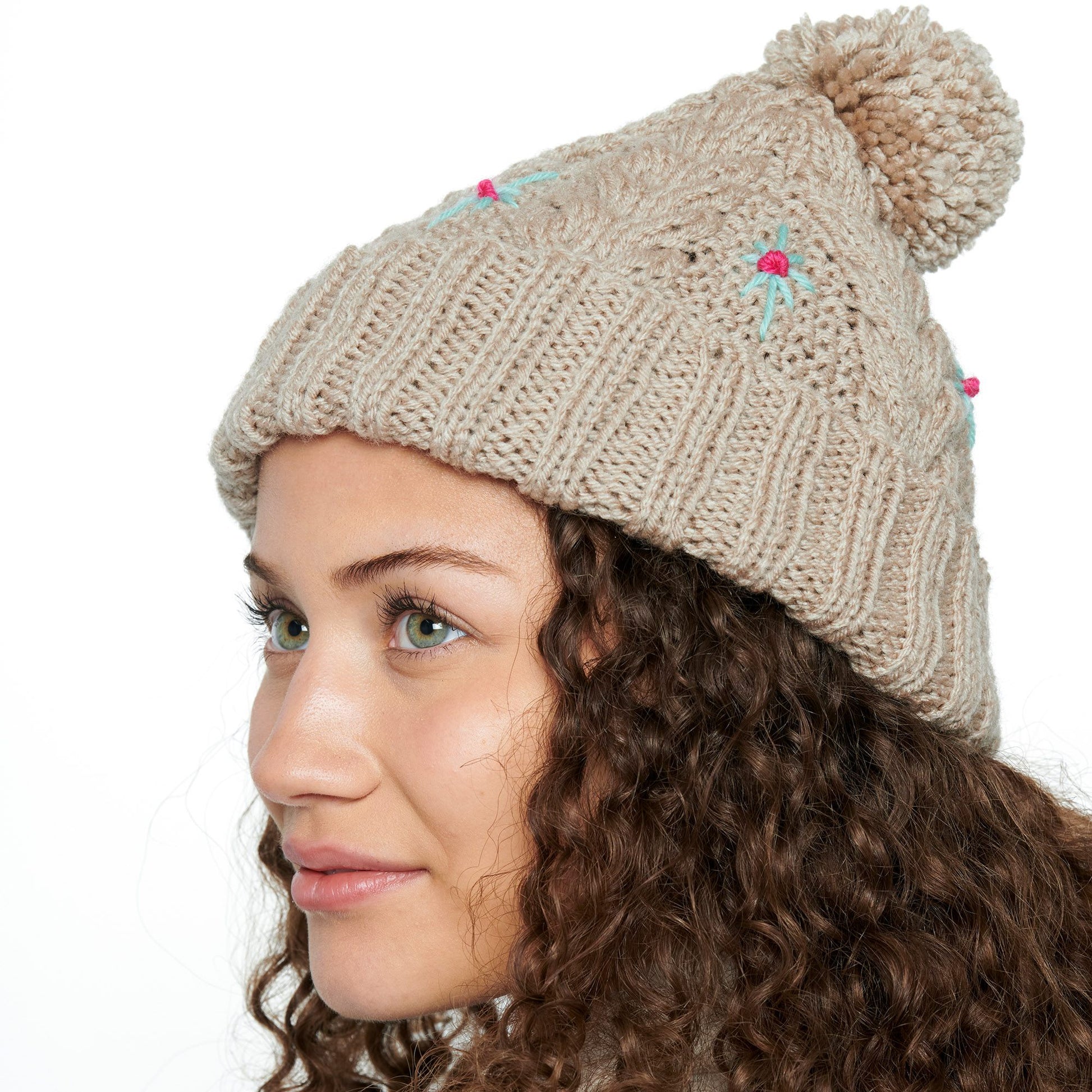Free Red Heart Embroidered Cable Hat Knitting Pattern | Yarnspirations