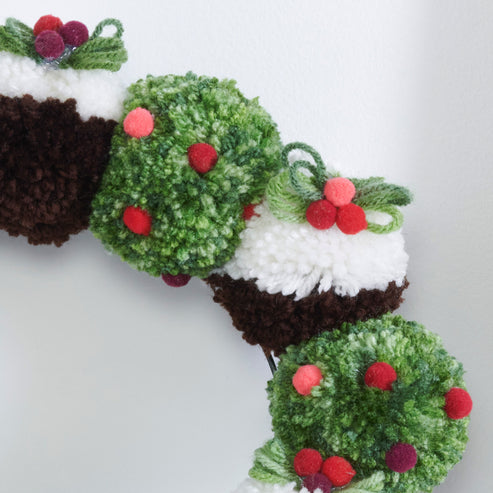 Free Beginner Red Heart Christmas Pudding Pom Pom Wreath Craft Pattern ...