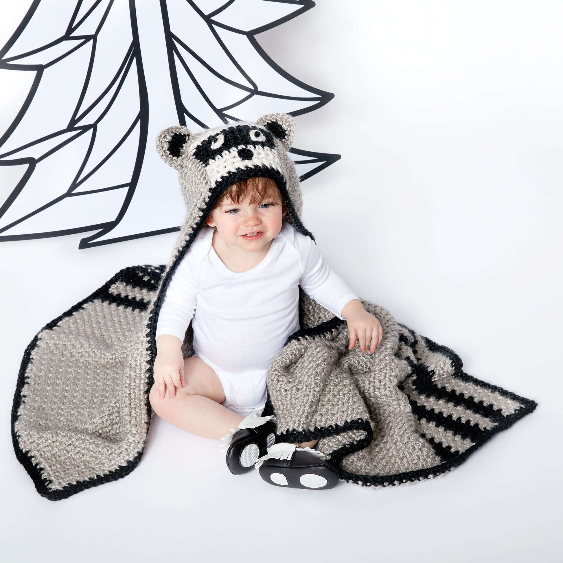 Free Bernat Lil' Bandit Crochet Blanket Pattern | Yarnspirations