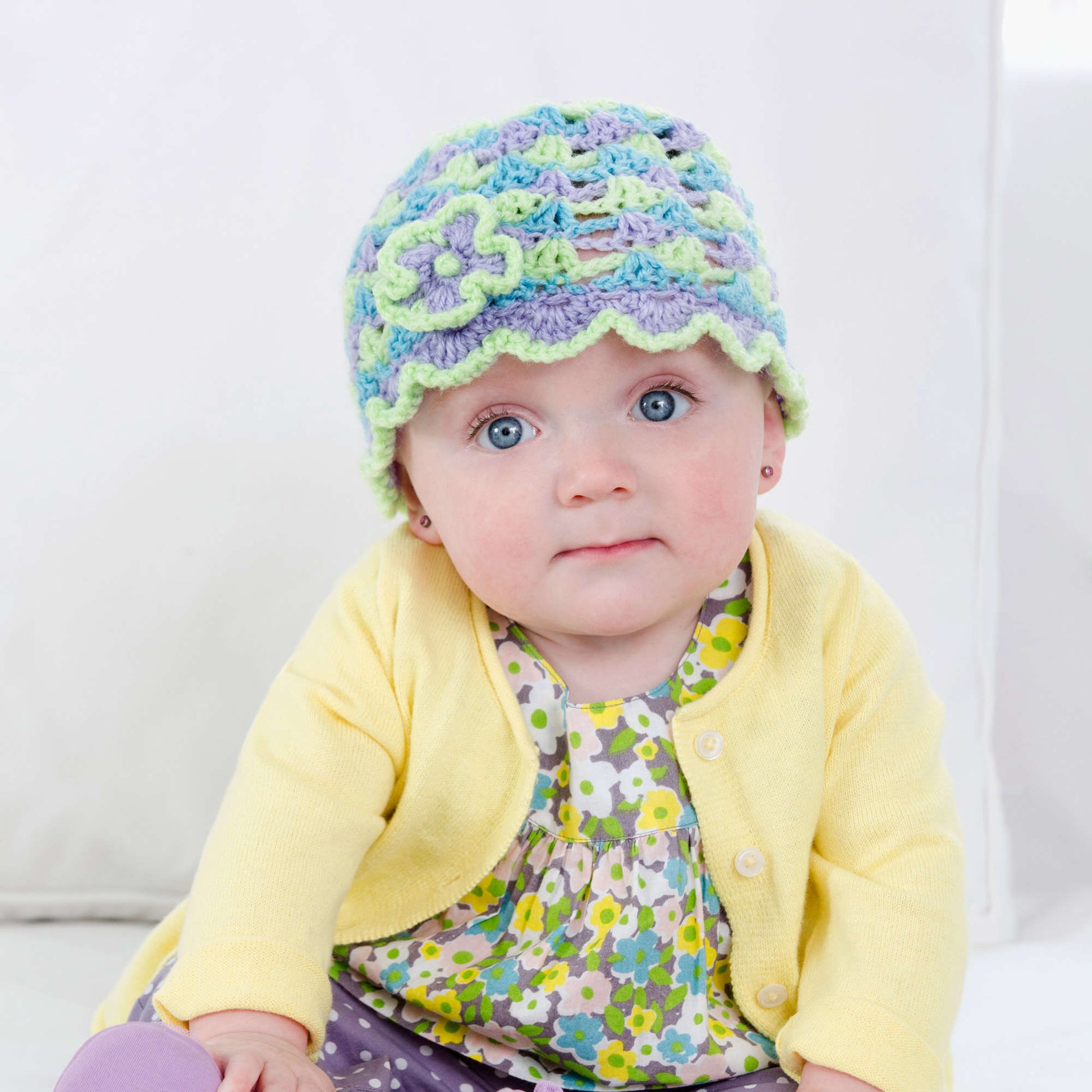 Free Easy Red Heart Ruffled Posies Hat Crochet Pattern | Yarnspirations