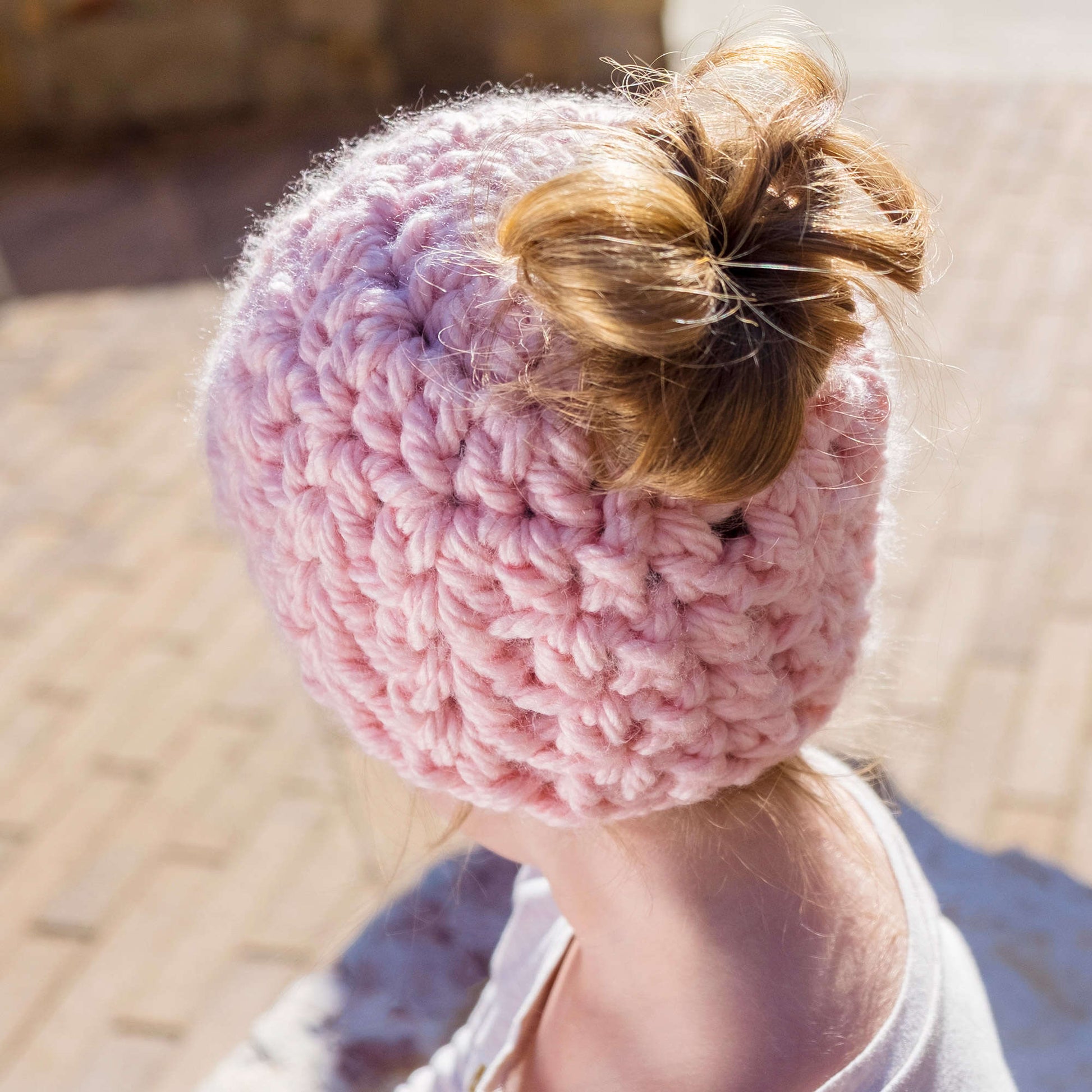 Free Beginner Red Heart Childs' Messy Bun Hat Crochet Pattern ...