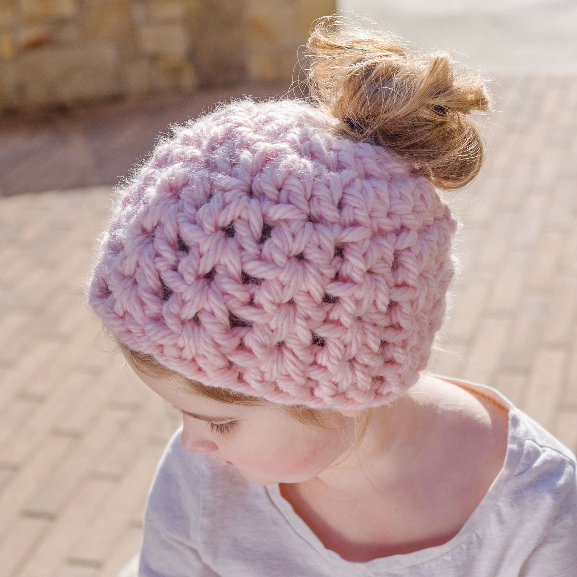 Free Beginner Red Heart Childs' Messy Bun Hat Crochet Pattern ...