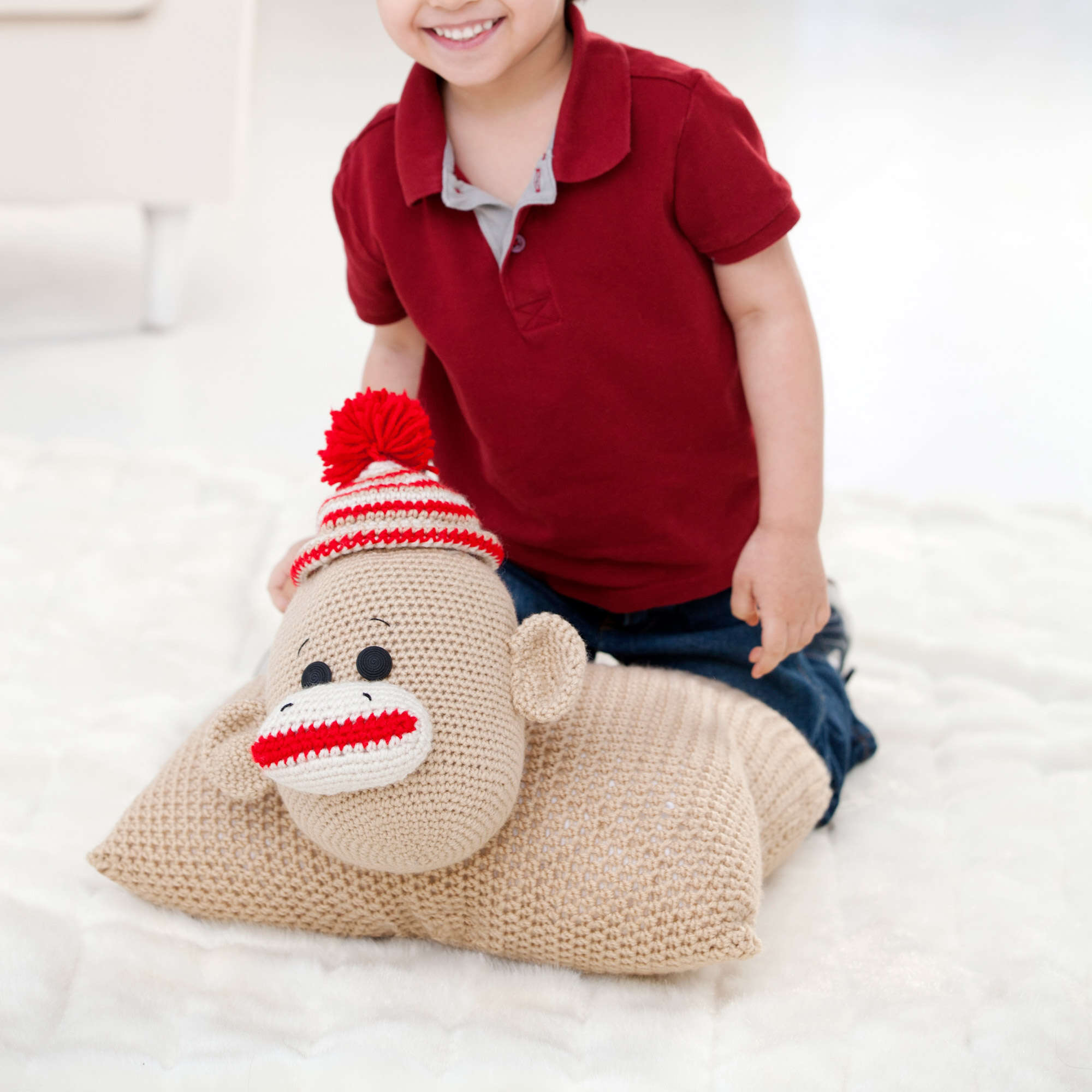 Free Easy Red Heart Sock Monkey Pillow Pal Crochet Pattern | Yarnspirations