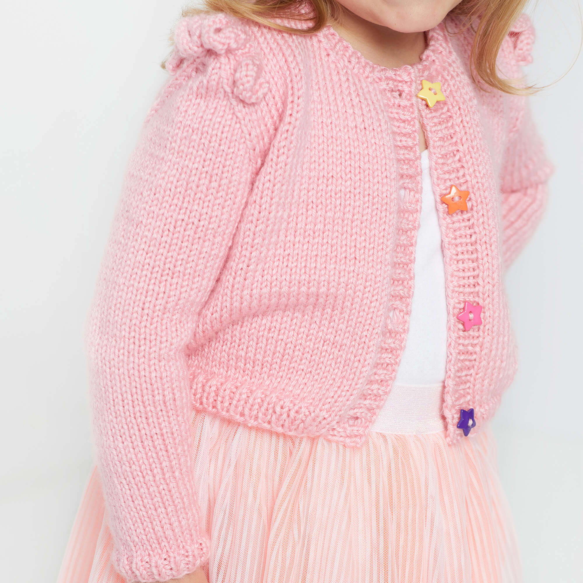 Free Red Heart Ruffled Shoulder Knit Cardigan Pattern | Yarnspirations