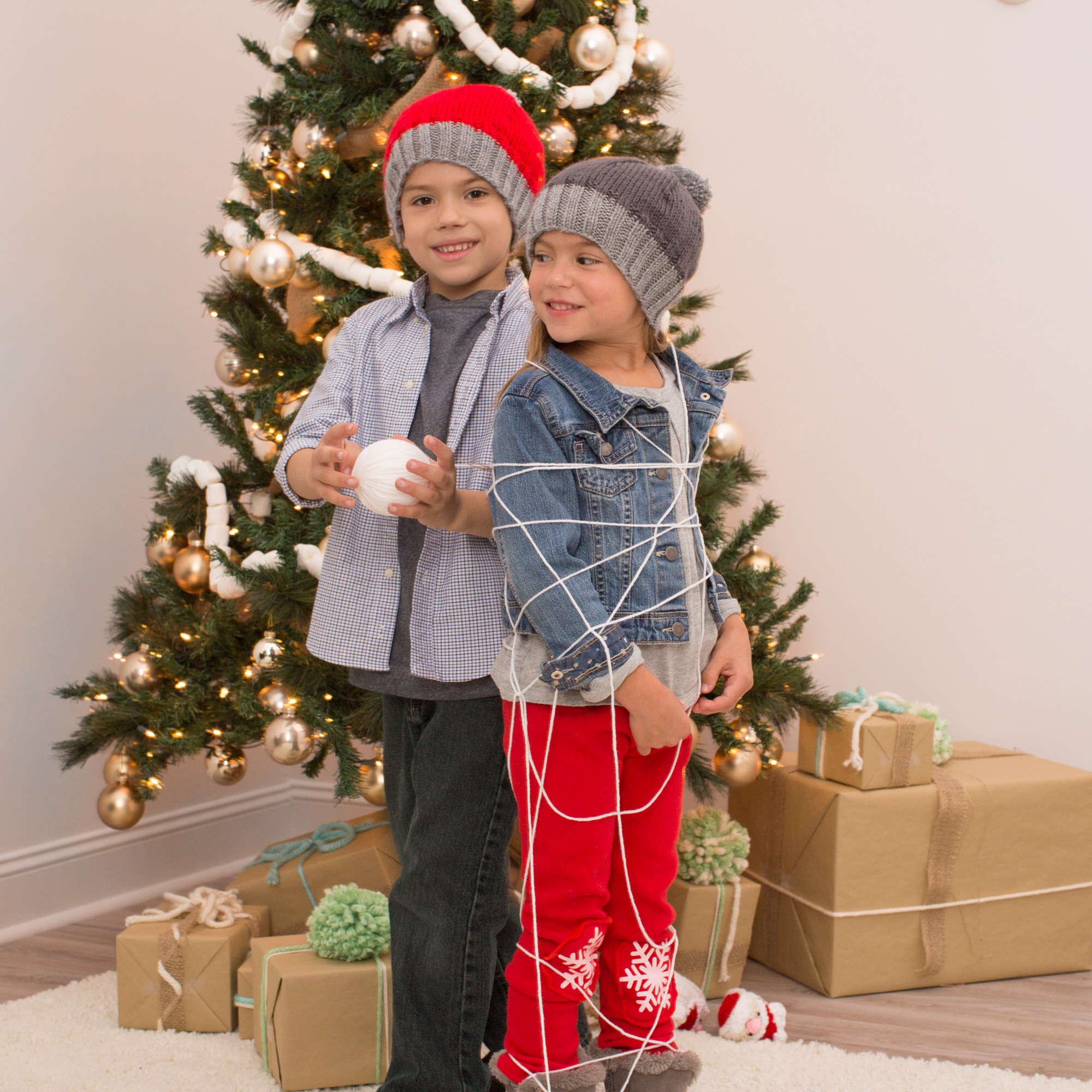 Free Easy Red Heart Two-Tone Kids' Hats Knitting Pattern | Yarnspirations