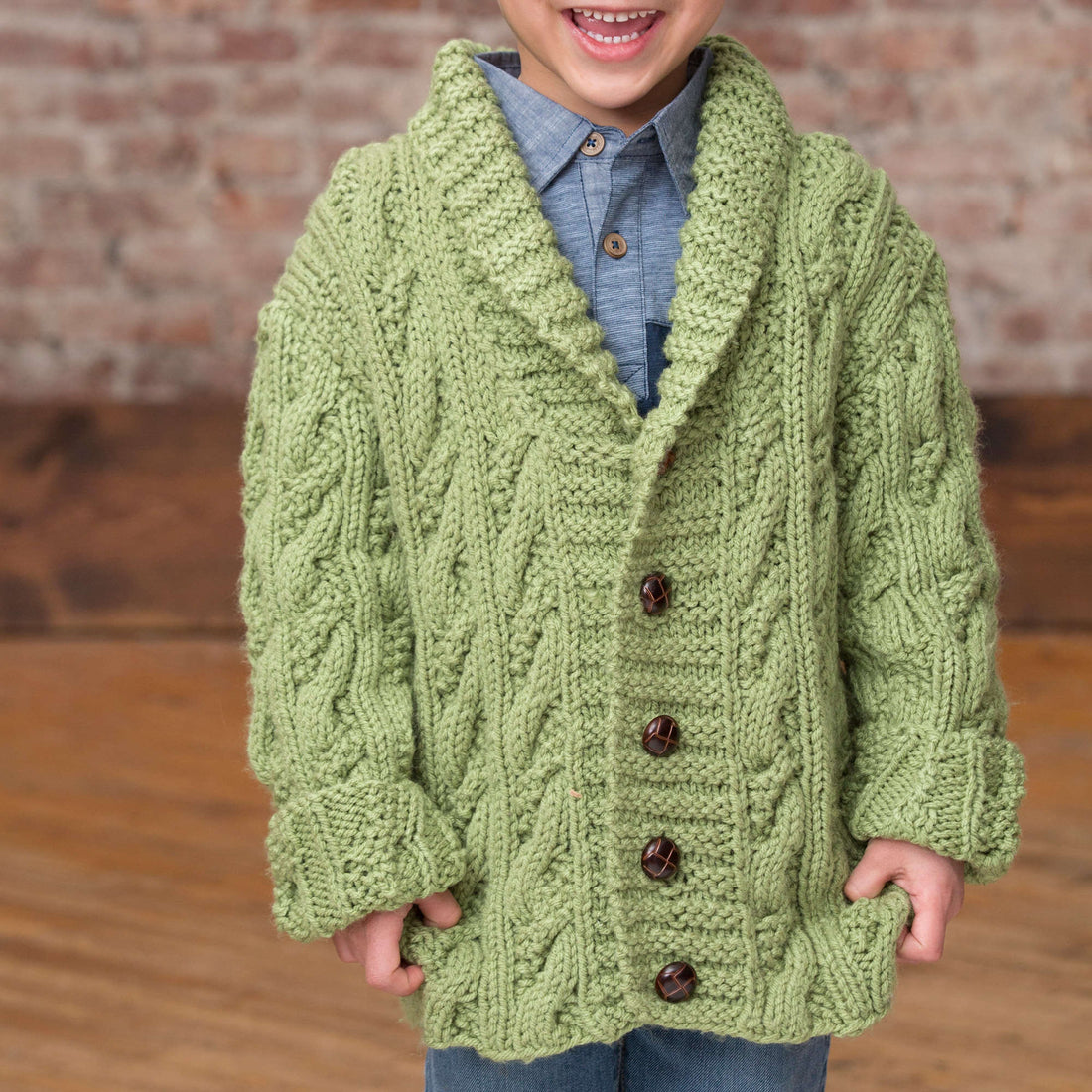 Free Red Heart Kid's Cable Knit Cardigan Pattern | Yarnspirations